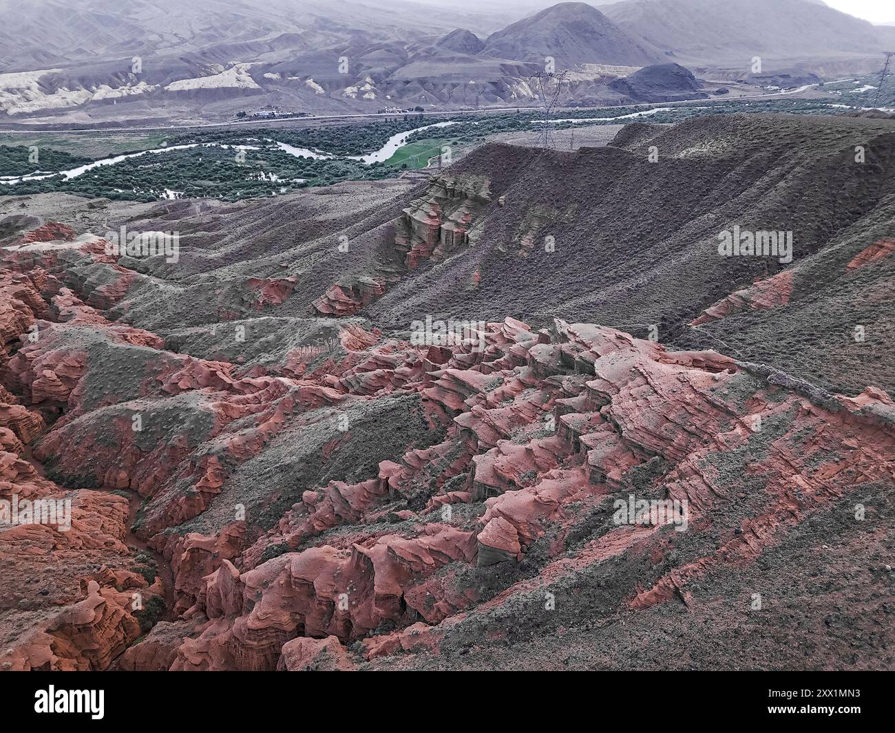 Kok-Moinok Canyon, a clay-sand structure formed on the slopes of arid ...