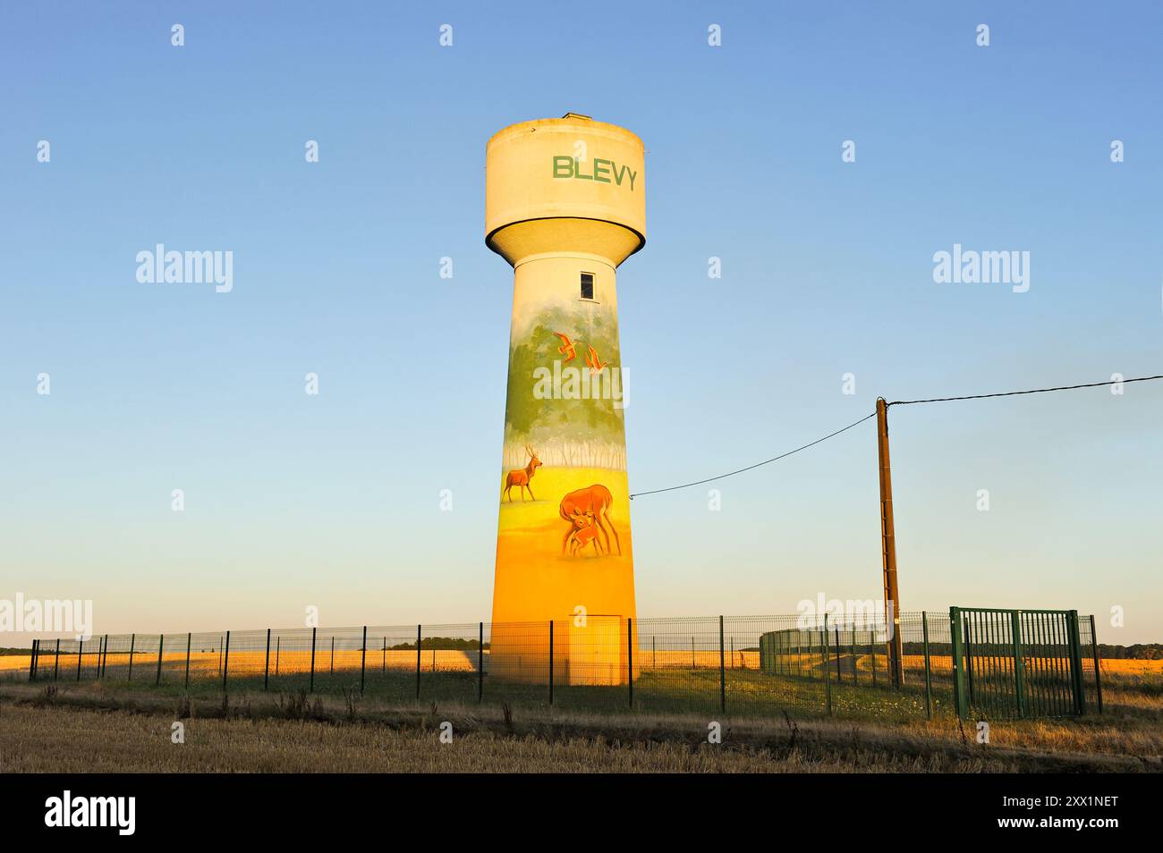 Mural painting, by Ateliers Adeline, on a water tower at Blevy, Natural ...