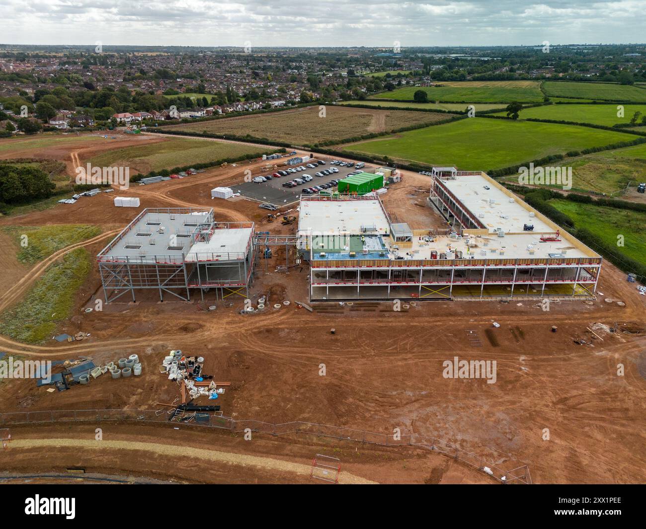 Aerial view of a commercial building under construction in the suburbs ...