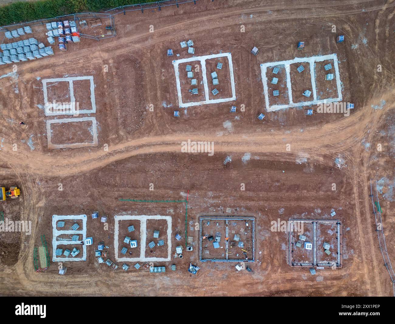 Aerial view of a construction site showing the foundations of new homes ...