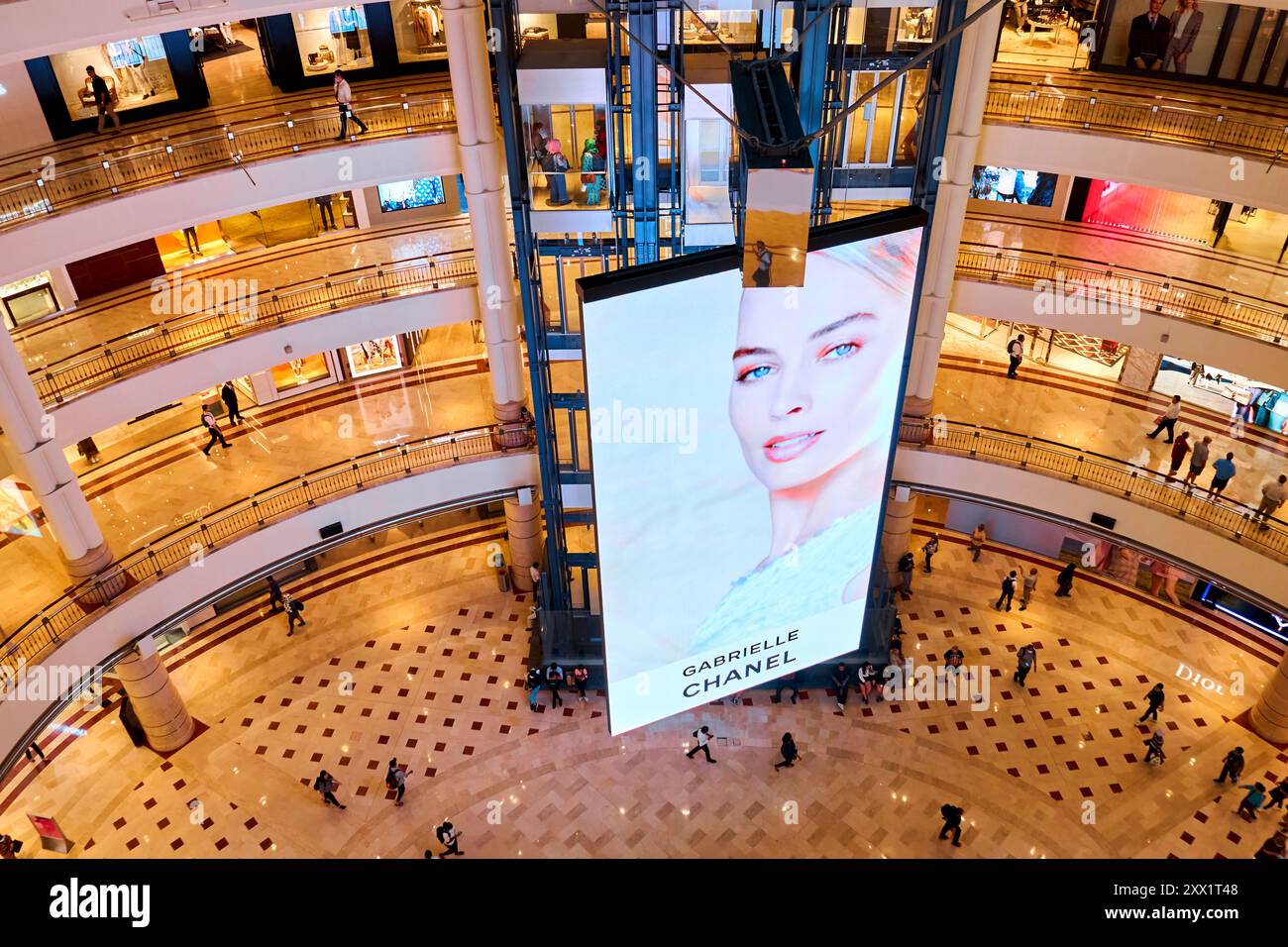 A modern interior inside a huge multi-storey shopping center. Kuala ...