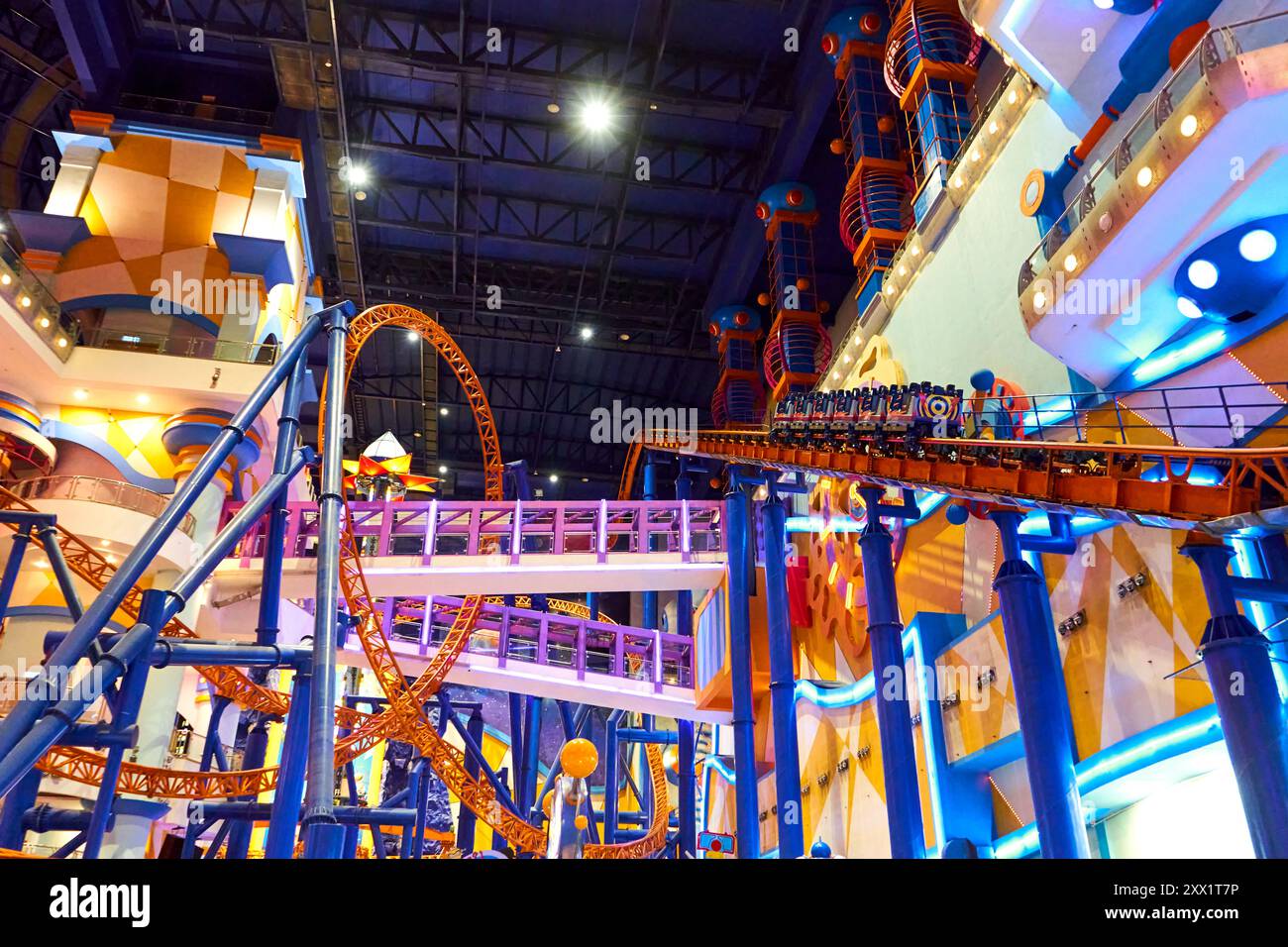 Roller coaster ride inside a shopping center in Kuala Lumpur. Kuala ...