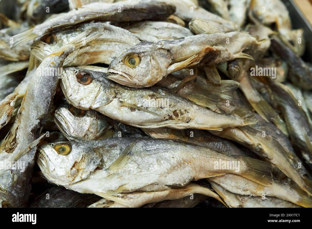 A large assortment of dried fish is on display in the Asian store Stock ...