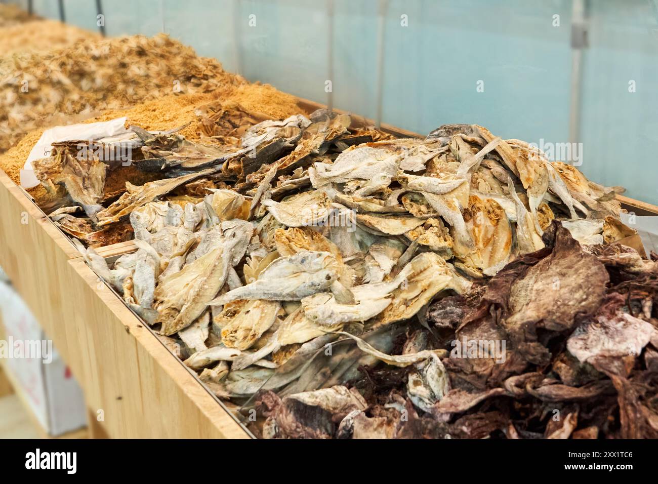 A large assortment of dried fish is on display in the Asian store Stock ...