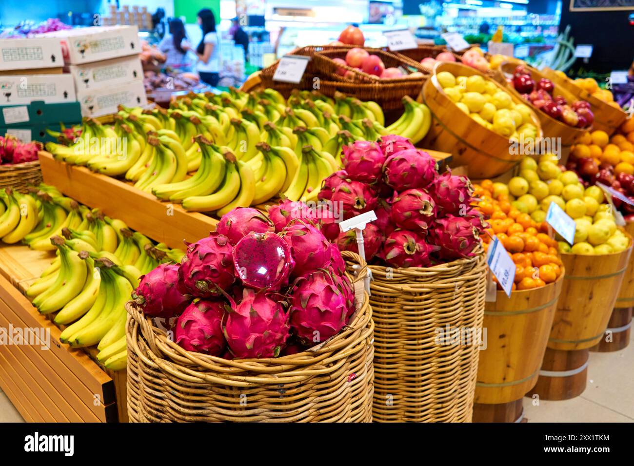 A large assortment of ripe, juicy colored fruits in an Asian ...