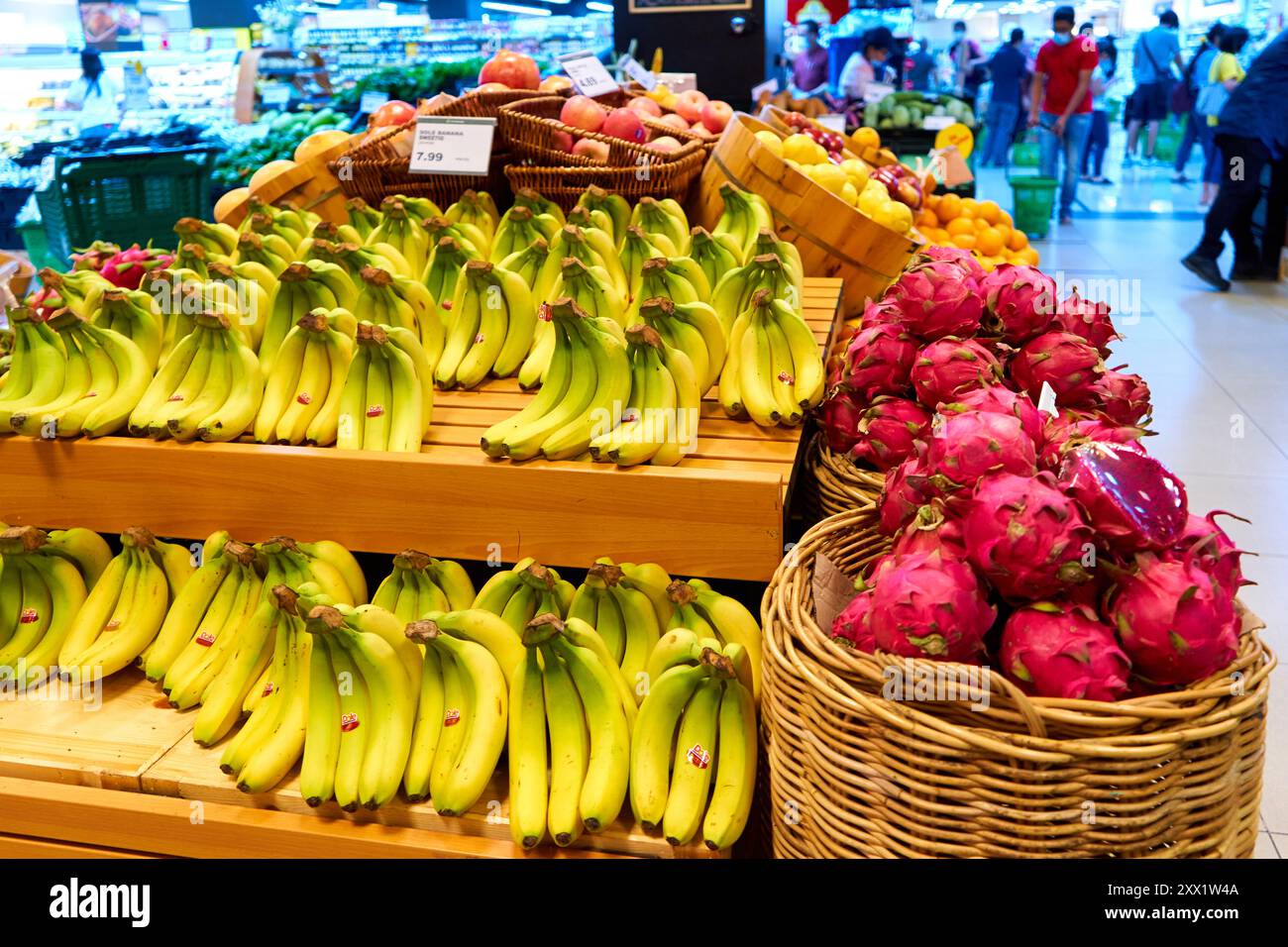 A large assortment of ripe, juicy colored fruits in an Asian ...
