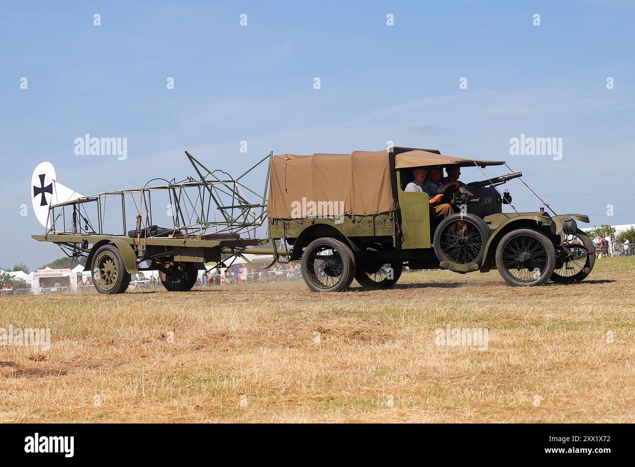 A Crossley tender 25/30 towing the tail end of an aircraft on parade at ...