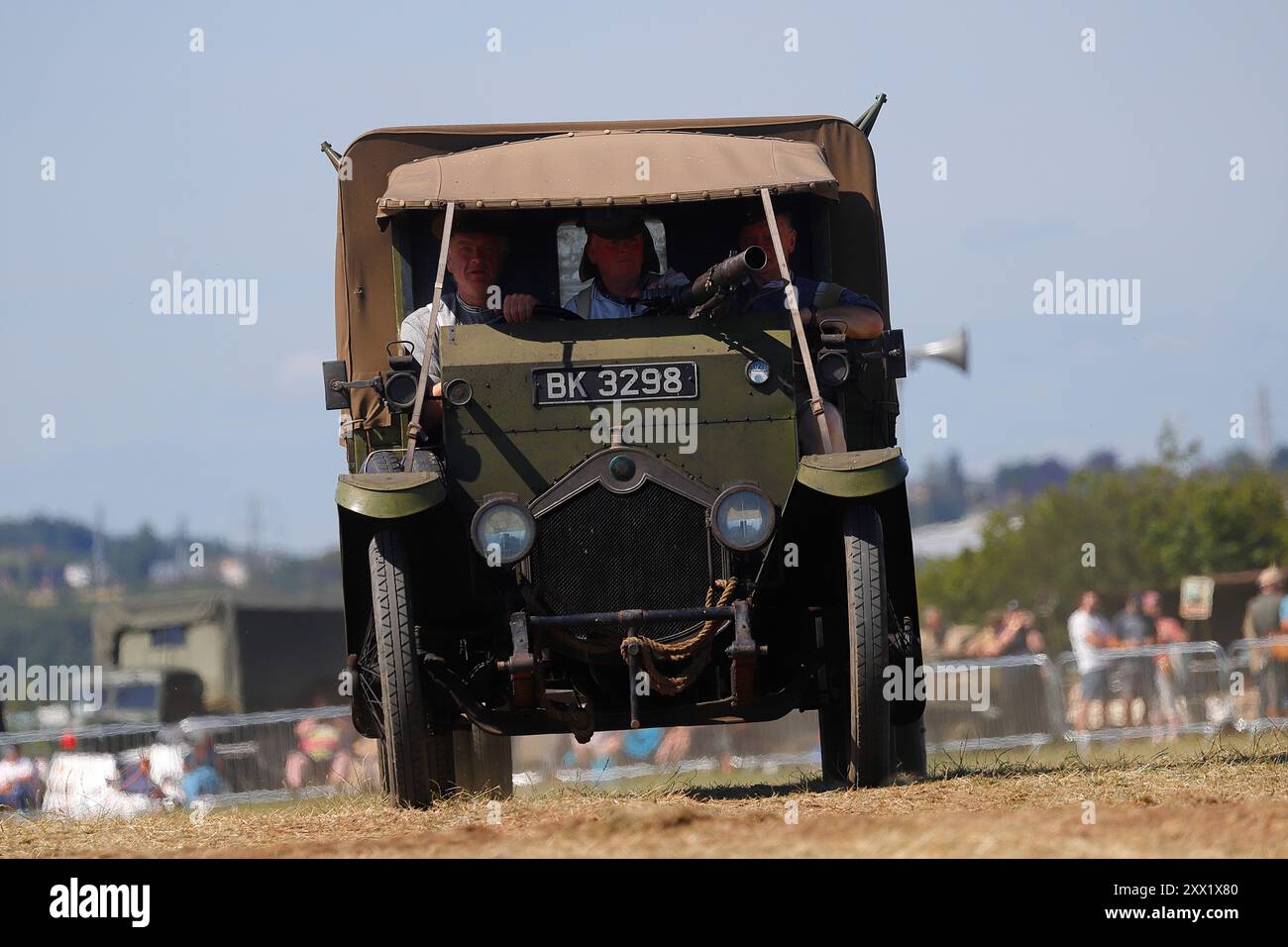 A Crossley tender 25/30 towing the tail end of an aircraft on parade at ...