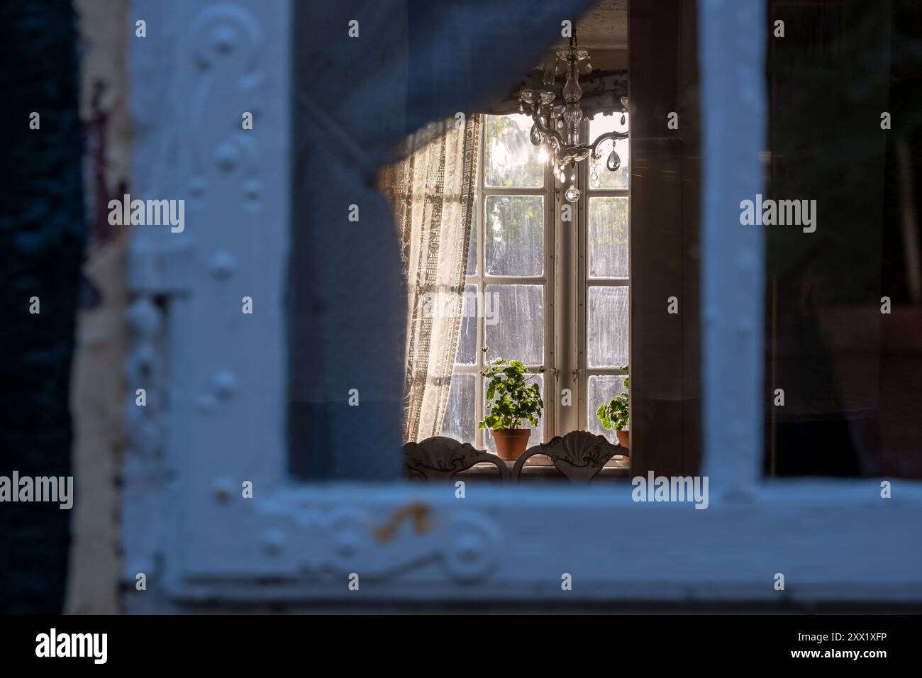 Evening light through a window at the Mariager Museum, a historical ...