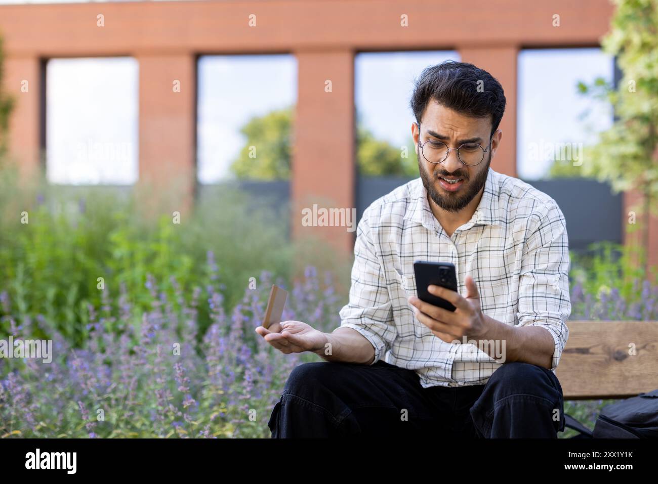 Upset worried indian man checking hi-res stock photography and images ...