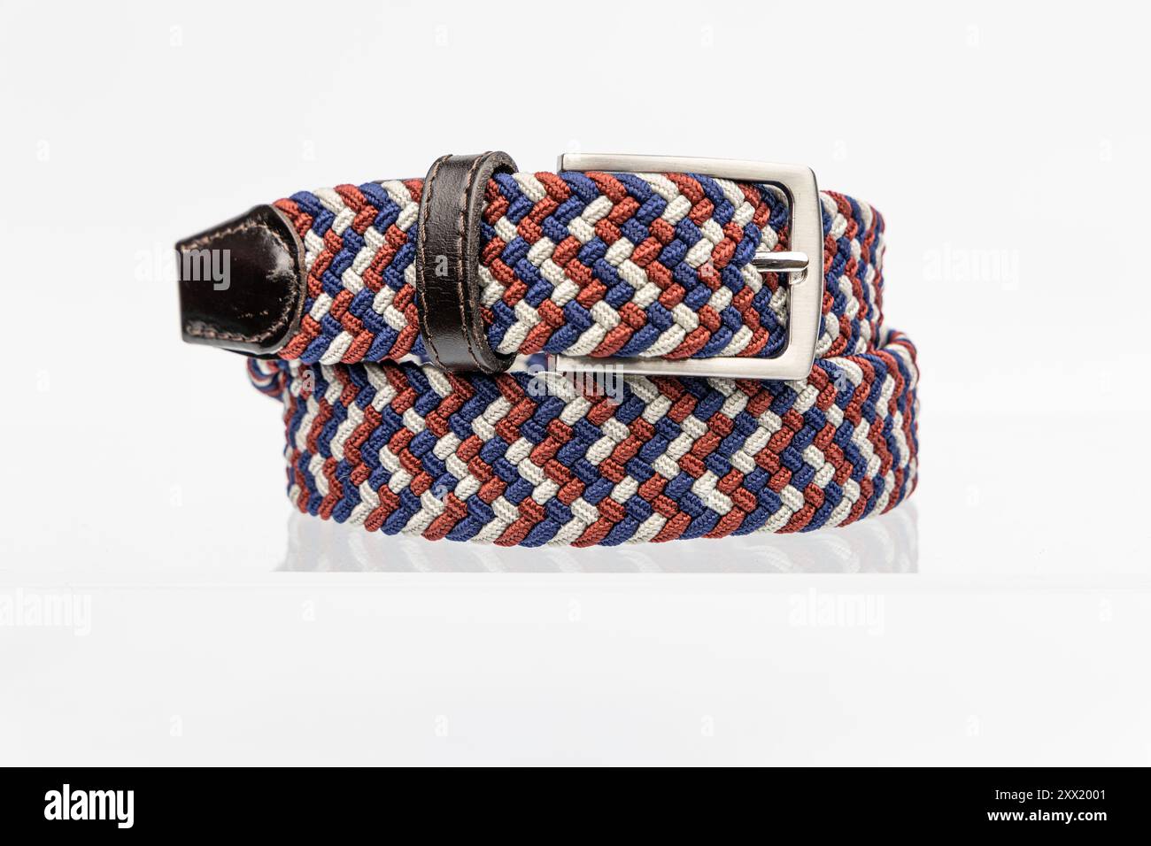 Blue red white Woven braided textile stretch belt isolated on white ...