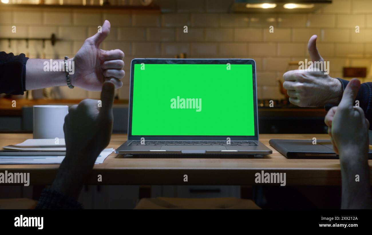 Laptop computer with mock up green screen chromakey display standing on ...