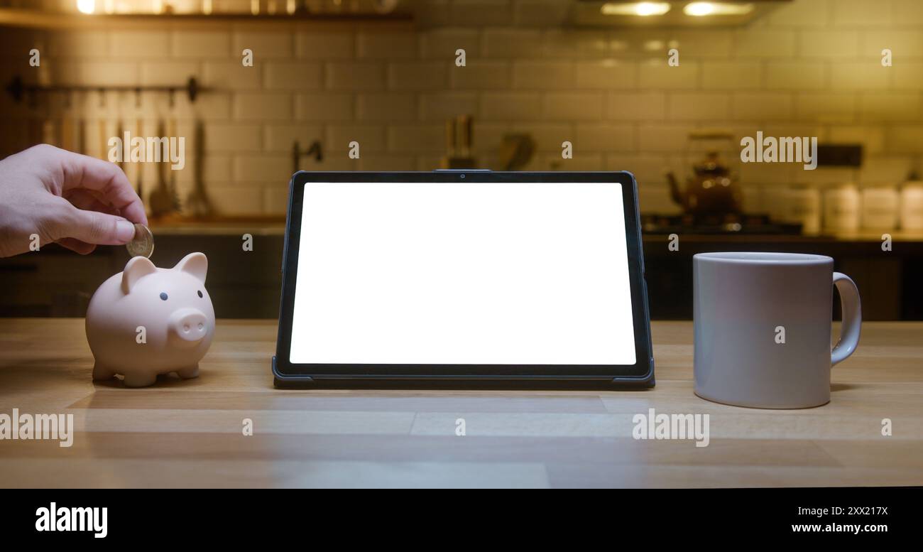 Tablet computer with mock up white screen chromakey display standing on ...