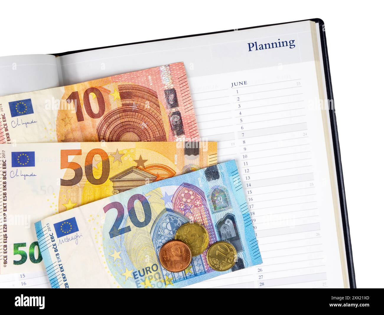 Close-up of Euro banknotes arranged on an open calendar with the names ...