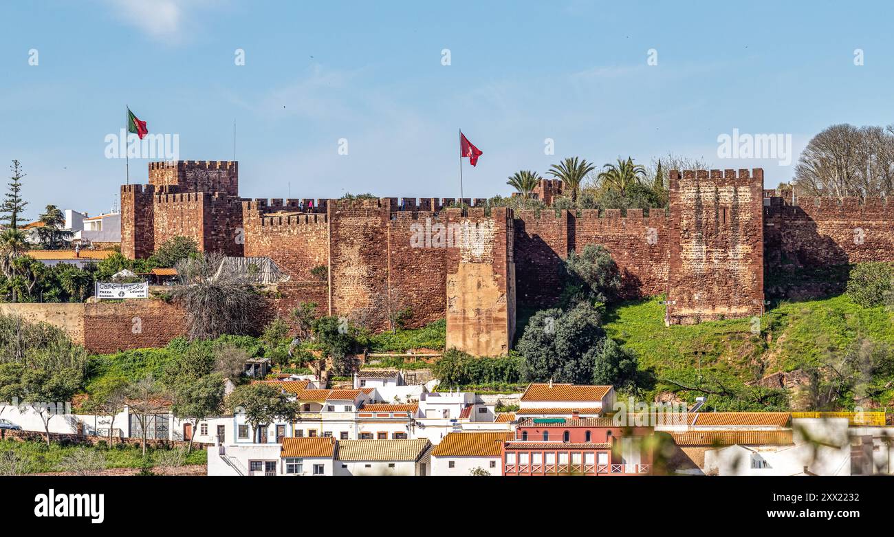 View of Silves town buildings with famous castle and cathedral, Algarve ...