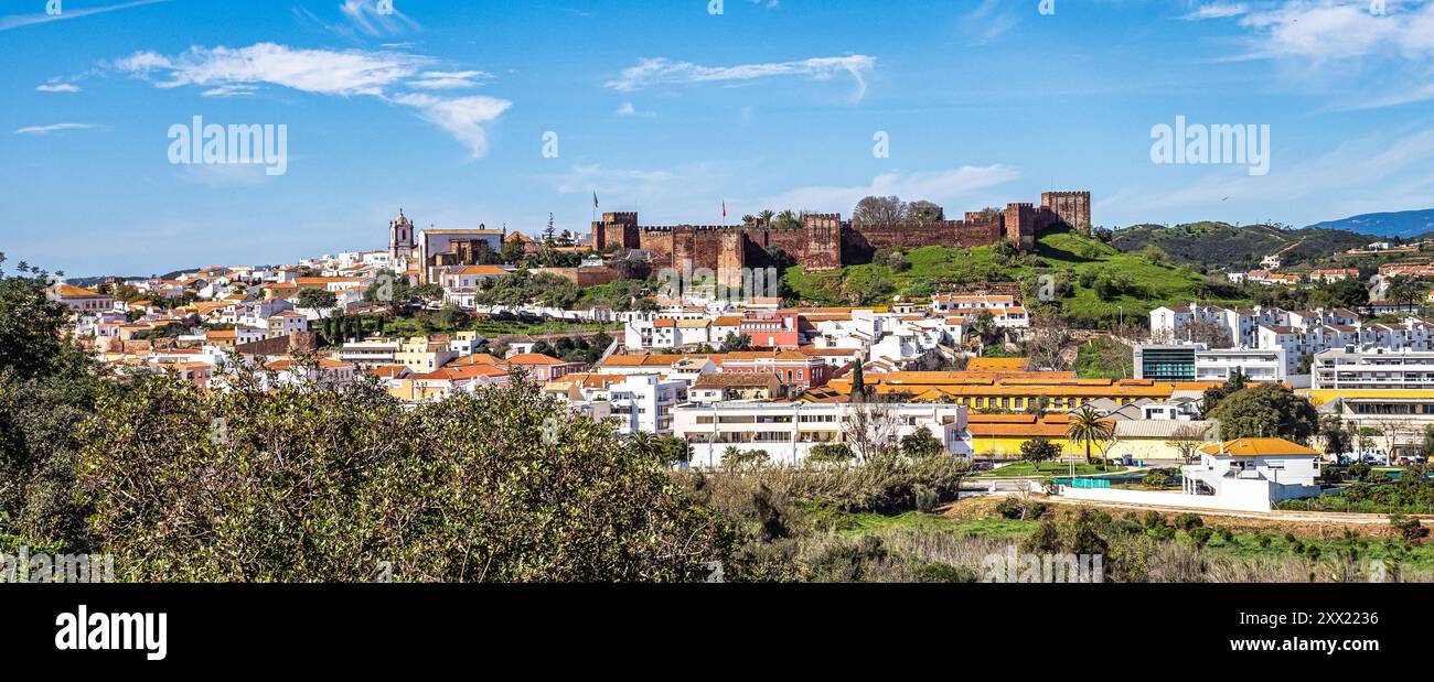 View of Silves town buildings with famous castle and cathedral, Algarve ...