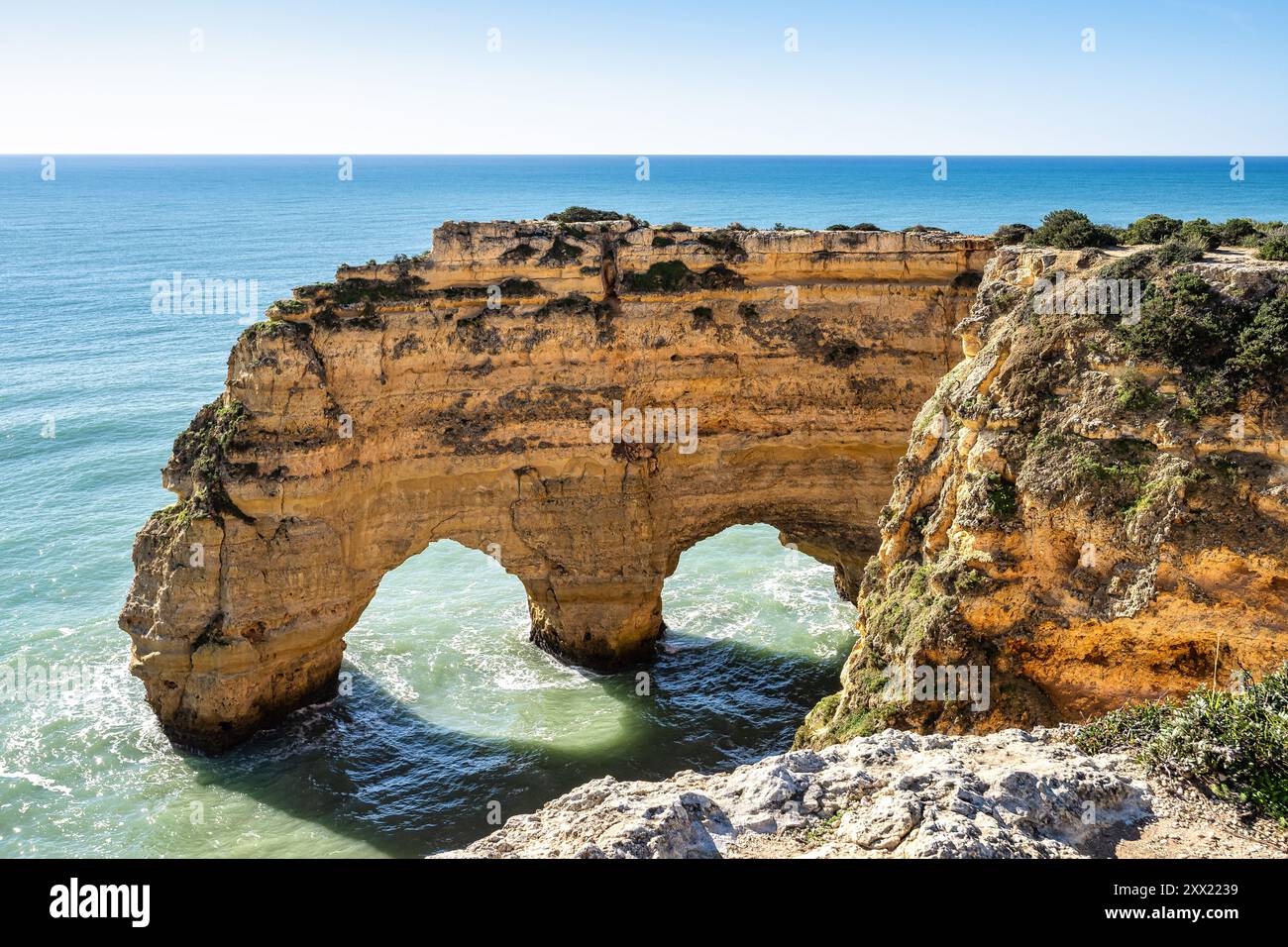 Praia da Marinha Beach among rock islets and cliffs seen from Seven ...
