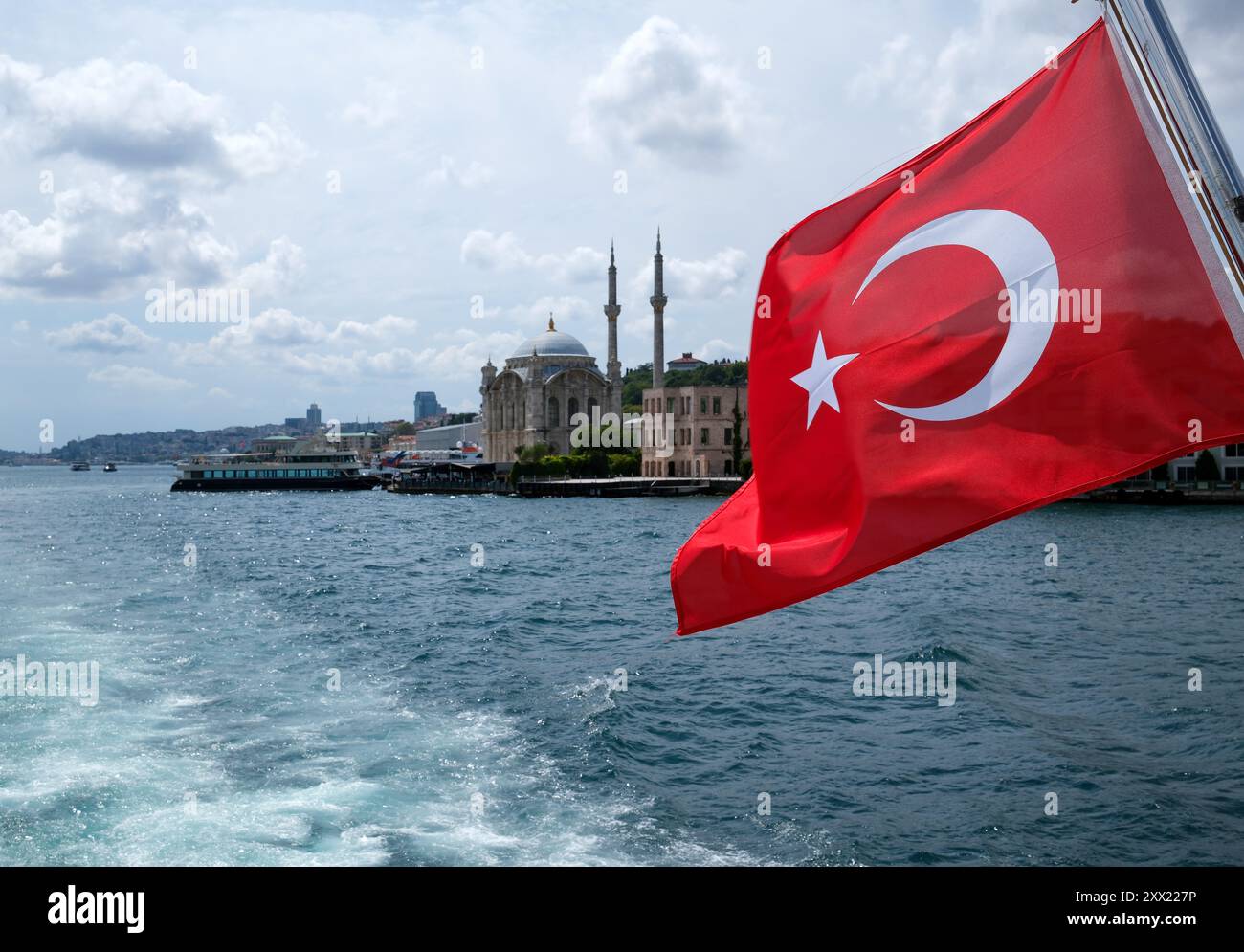 A view of Istanbul from a ferry with a Turkish flag Stock Photo - Alamy
