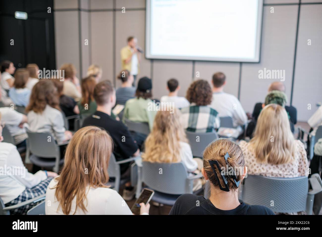 Serious audience listening speaker hi-res stock photography and images ...