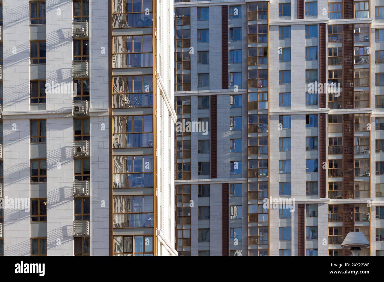 The fragment of facade of modern multi-storey residential building, the ...