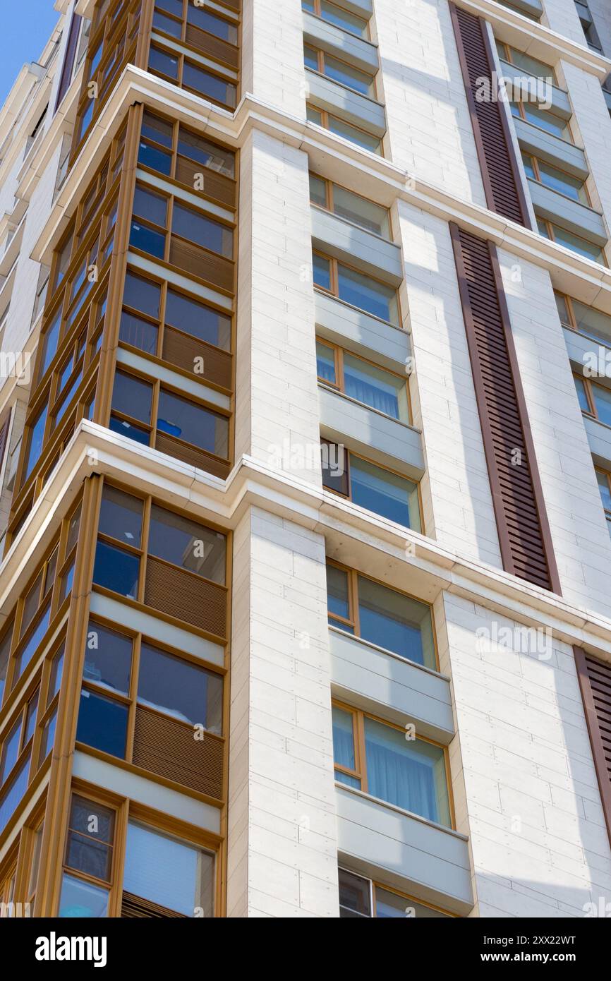 The fragment of facade of modern multi-storey residential building, the ...