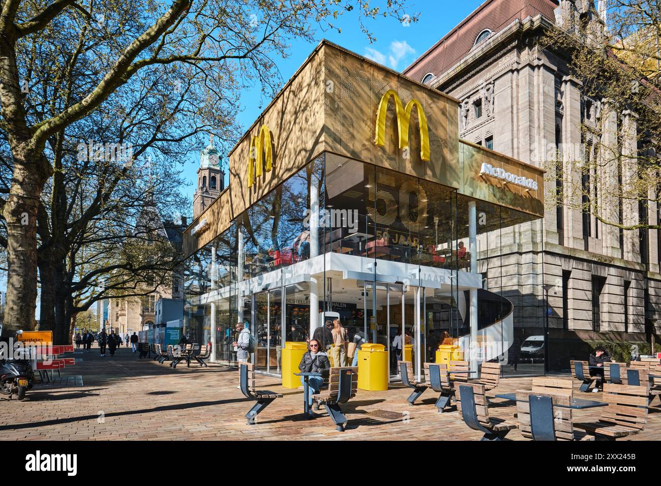Rotterdam, Netherlands - April 10, 2024: Golden McDonald’s pavilion in ...