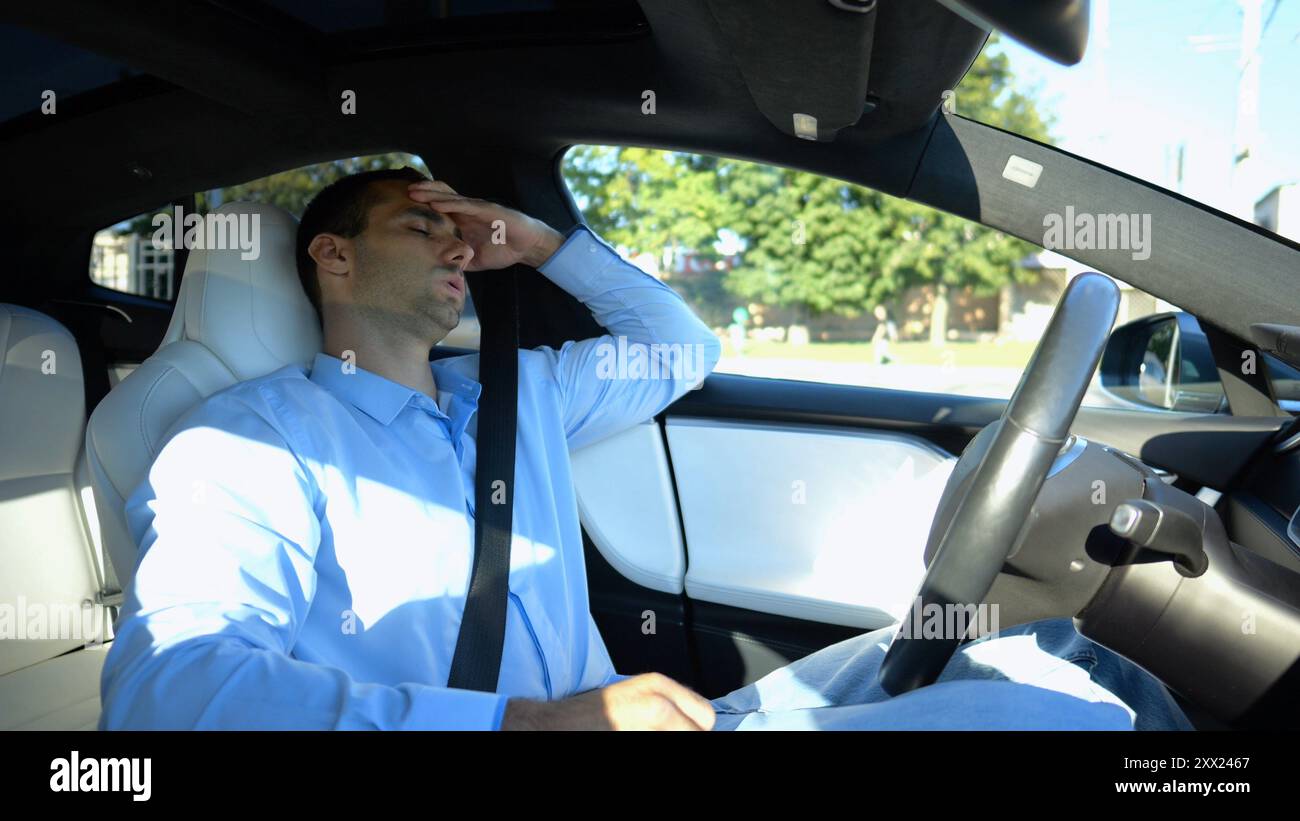 Male businessperson experience to ride an autonomous self driving ...