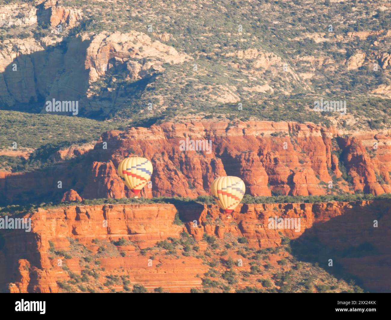 Two hot air balloons and red rocks in Sedona, Arizona Stock Photo - Alamy