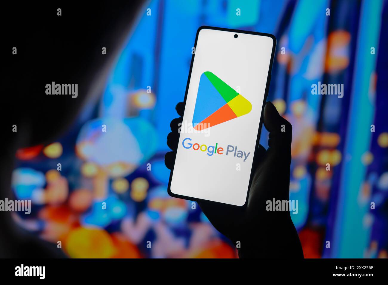 In this photo illustration, the Google Play logo is displayed on a ...