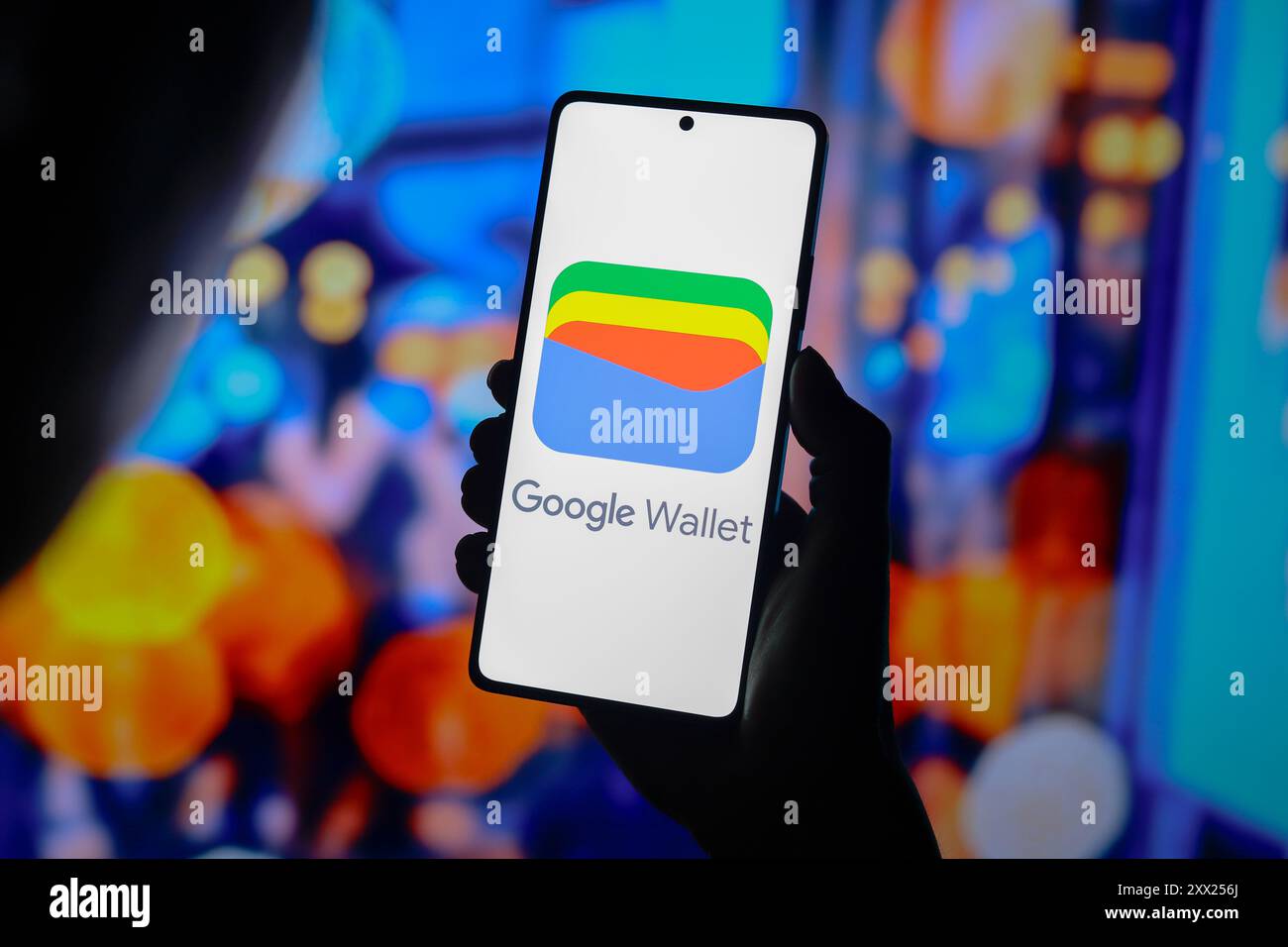 In this photo illustration, the Google Wallet logo is displayed on a ...