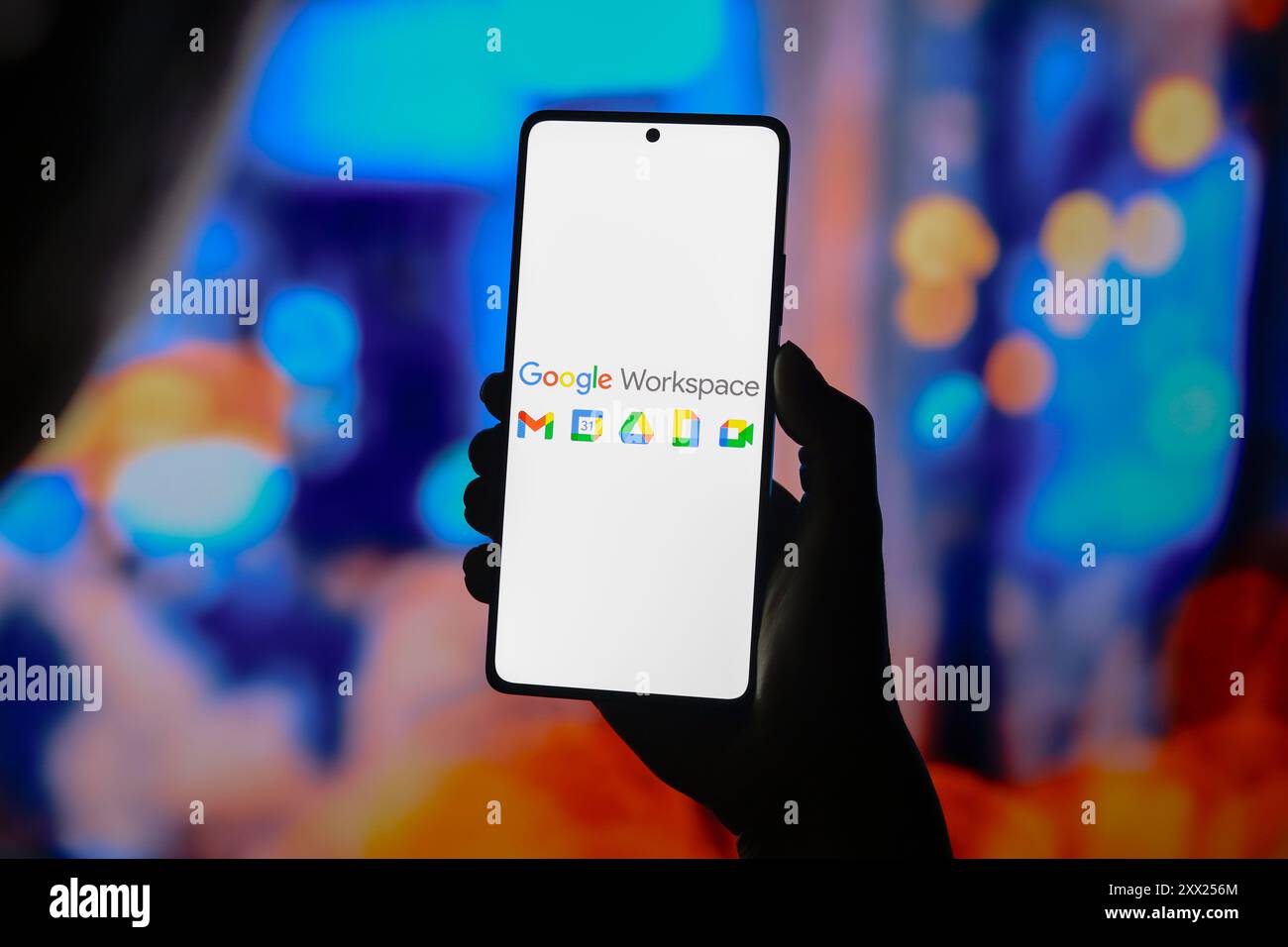 In this photo illustration, the Google Workspace logo is displayed on a ...