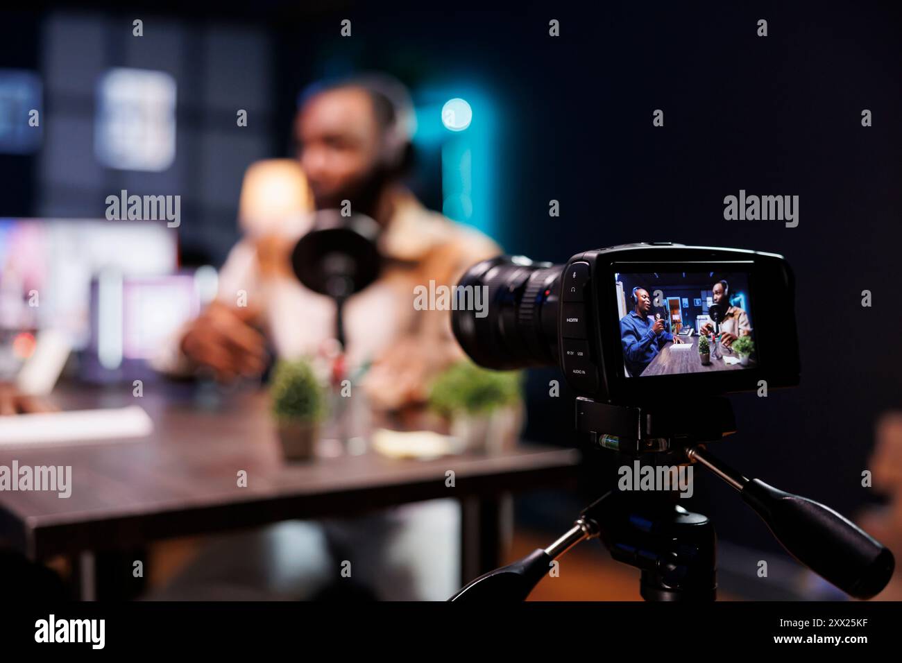 Detailed view of professional camera filming a live talk show between ...