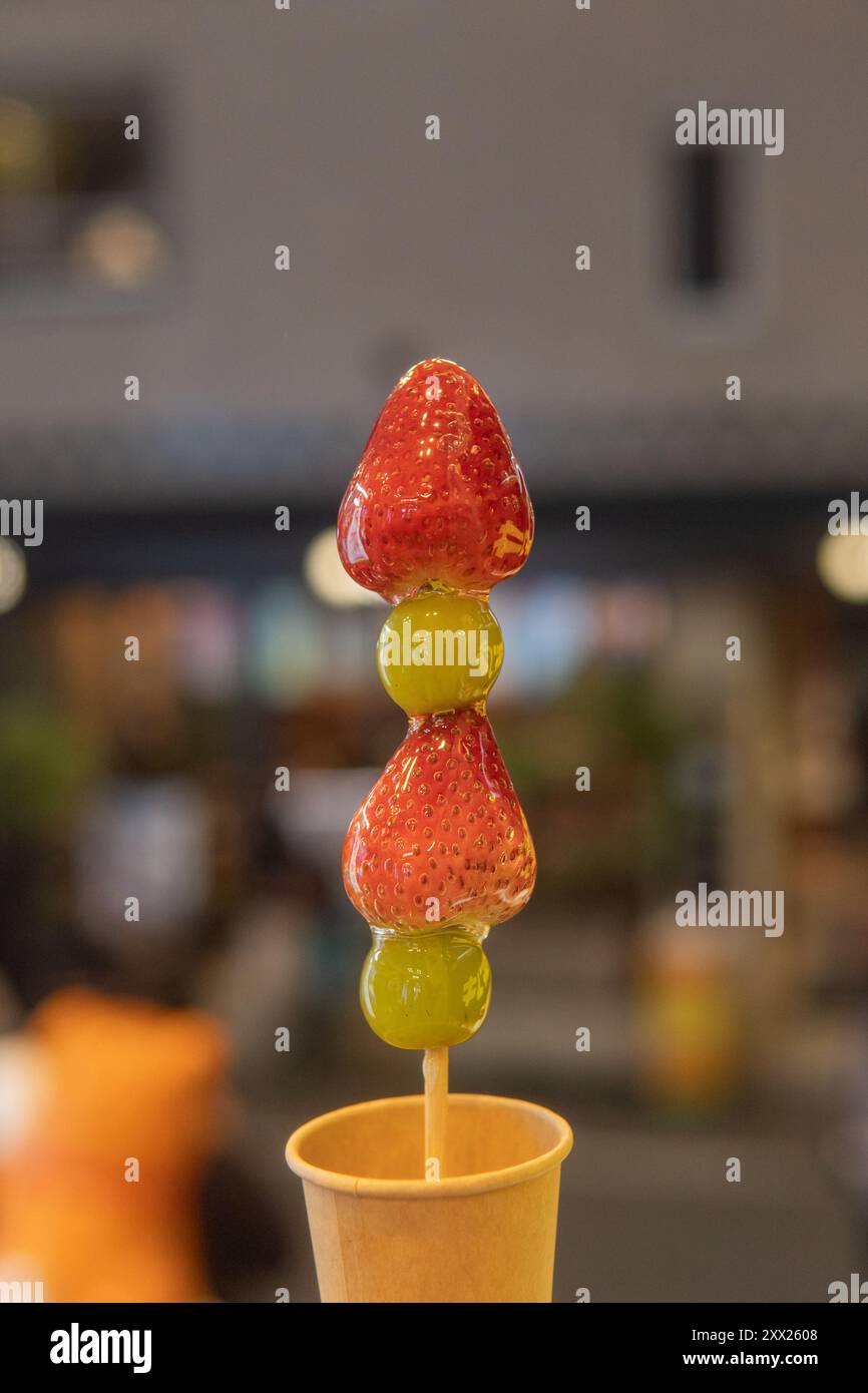 Candied Strawberry and Grape Skewer Dessert, Japan Stock Photo - Alamy