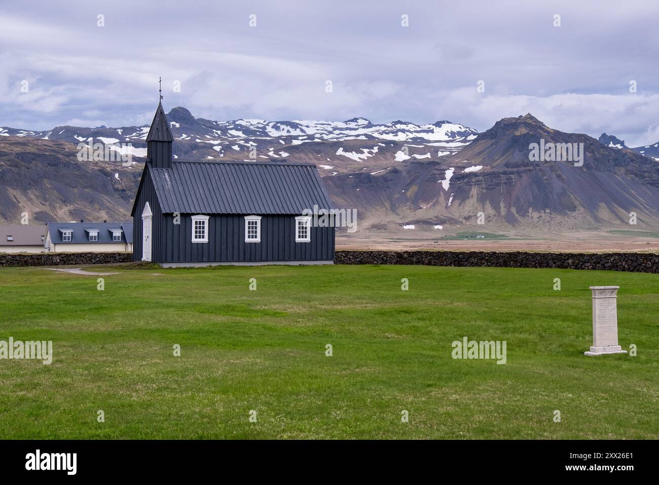 Budakirkja (Black Church) with mountain backdrop, Budir, Snaefellsnes ...