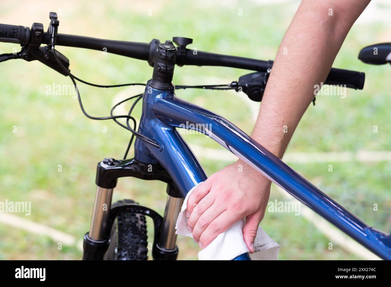 Man cleaning bicycle soap foam hi-res stock photography and images - Alamy