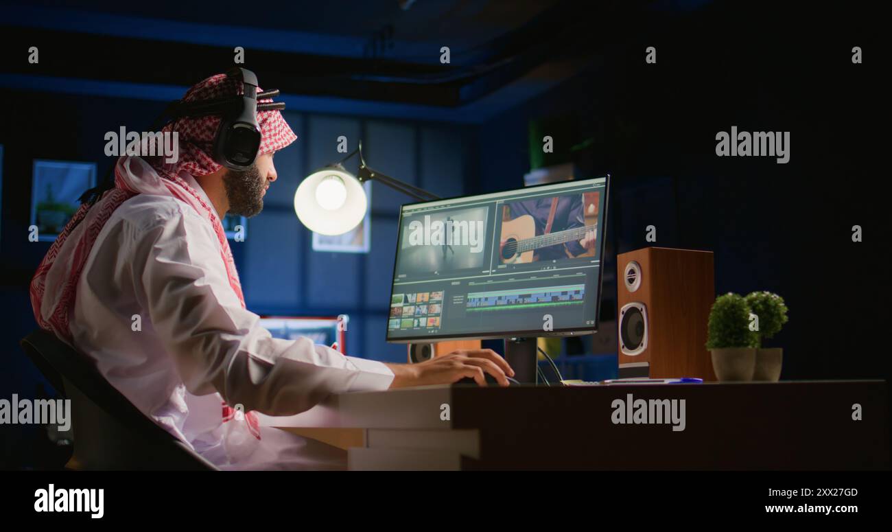 Multimedia editor working on cinematographic project, creating editing ...