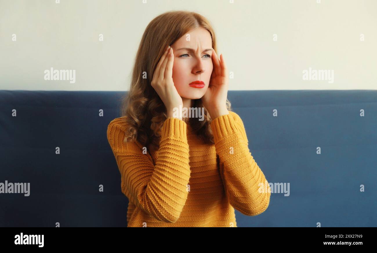 Exhausted tired woman touching head, suffering from headache, stress ...