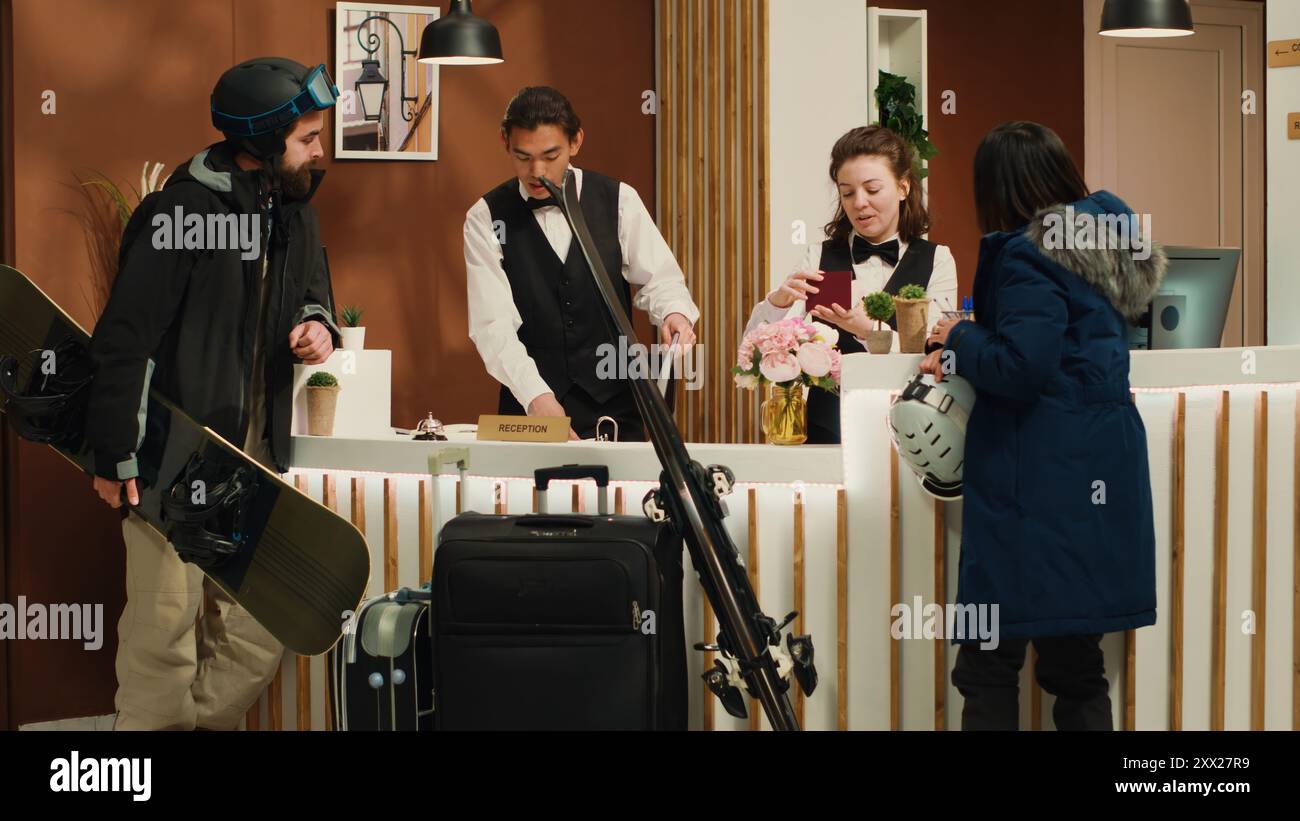 Tourists doing check in process hi-res stock photography and images - Alamy