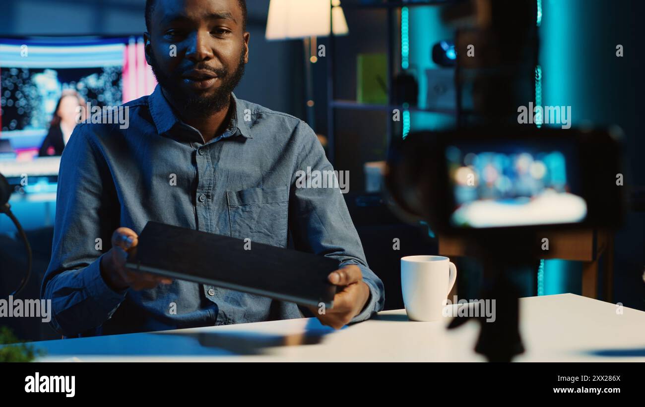 Technology content creator filming review of newly released gaming ...