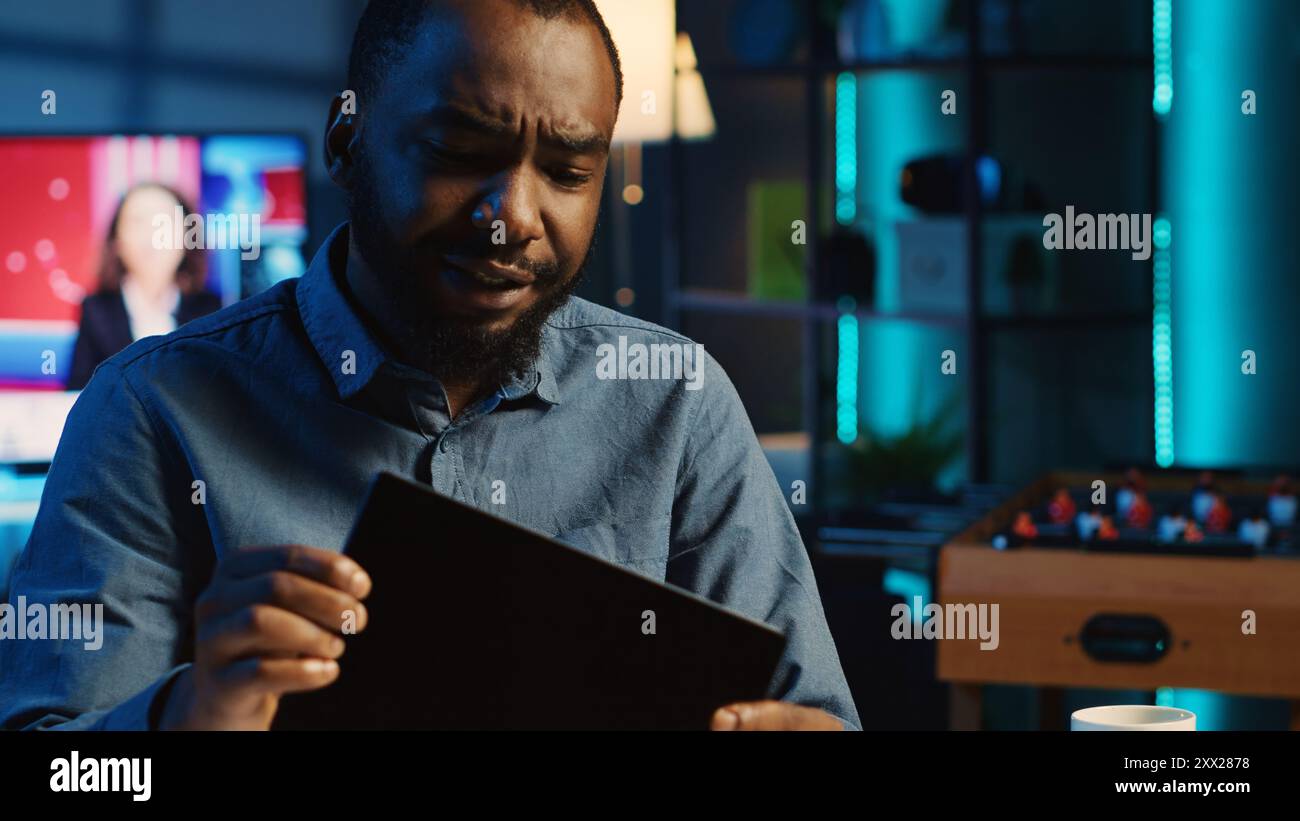 African american content creator filming technology review of newly ...