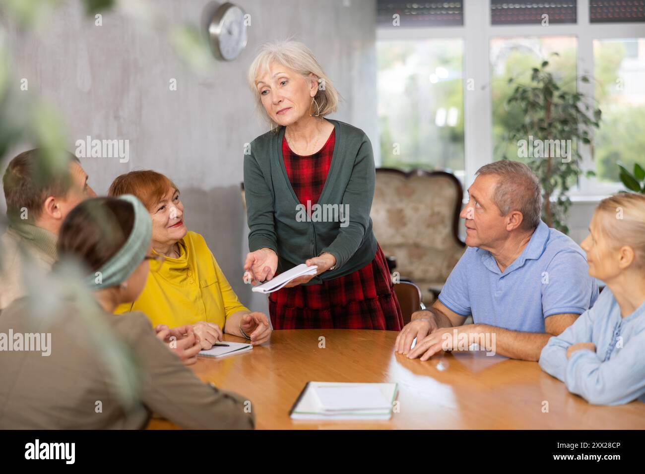 Communication of elderly at the round table. Training and group therapy ...