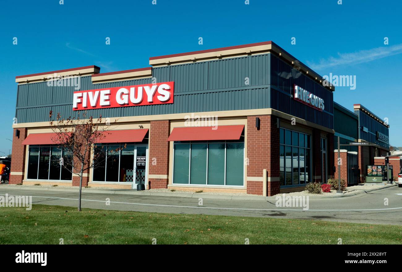 Five Guys fast food restaurant specializing with a variety of burgers ...