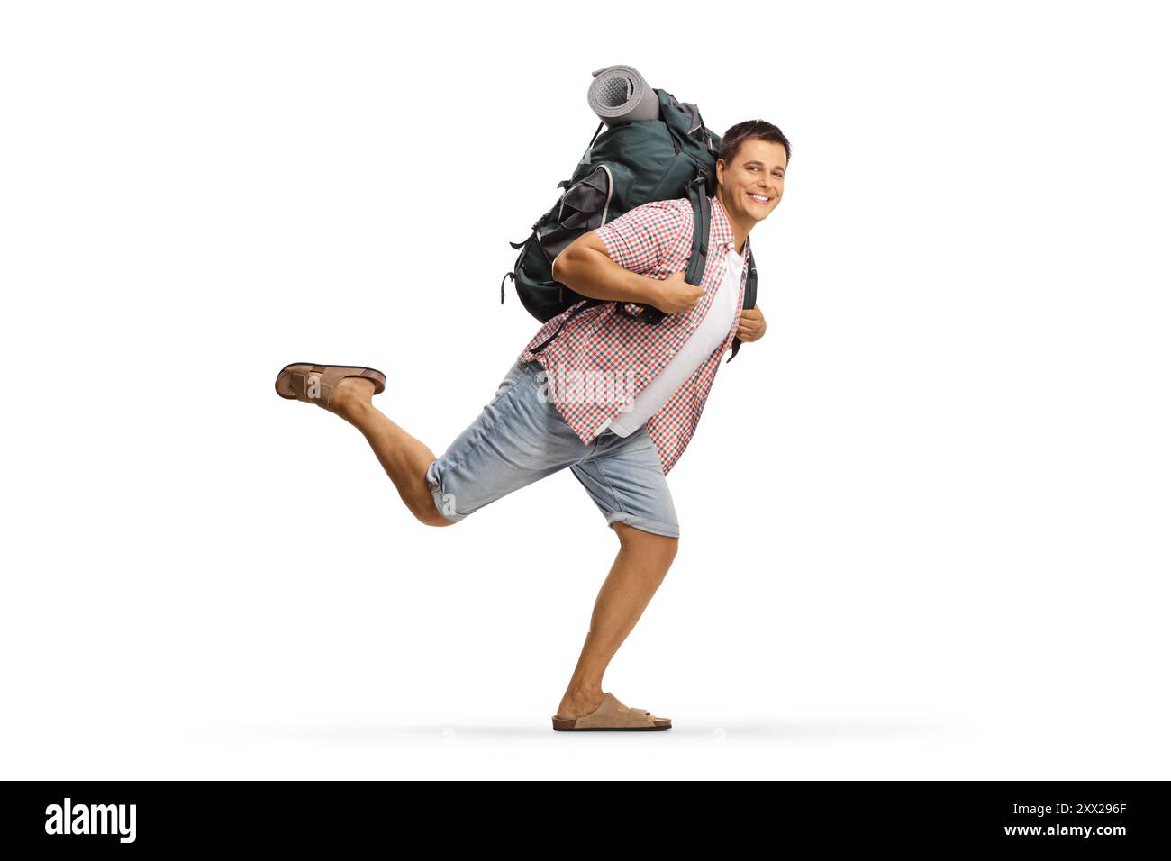 Male city tourist with a backpack running isolated on white background ...