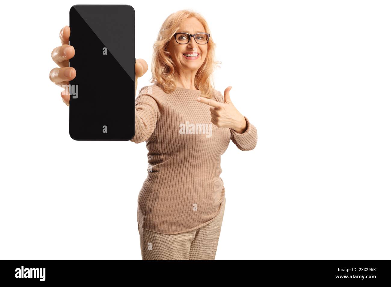 Happy smartphone user pointing at screen isolated on white background ...