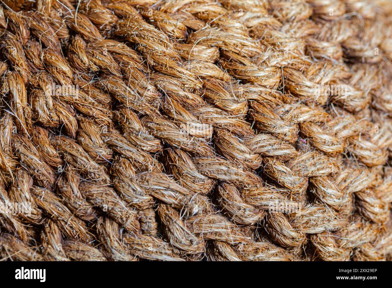 Woven rope enveloping an antique glass net float Stock Photo - Alamy