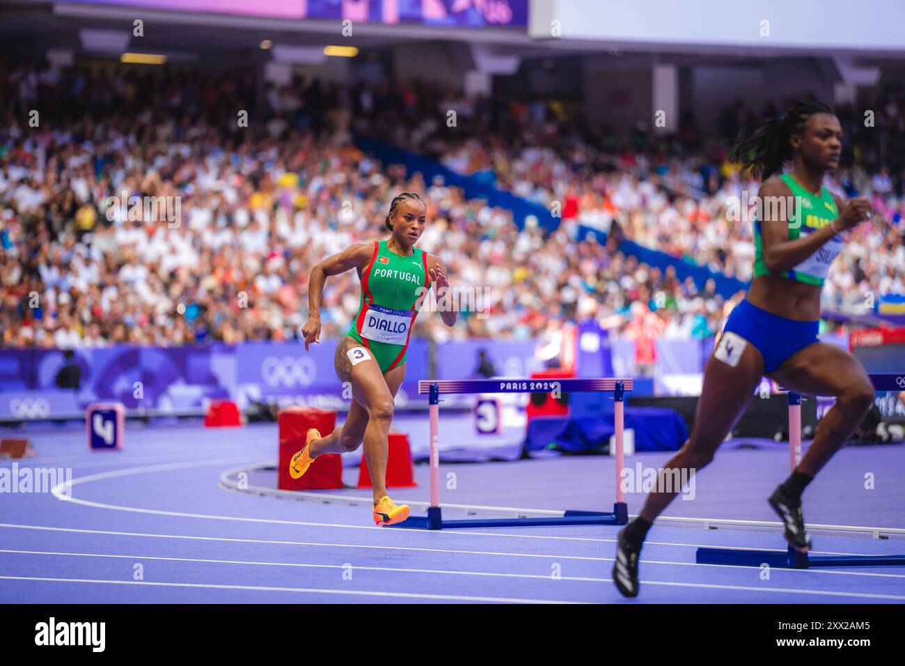 Fatoumata Binta Diallo participating in the 400 meters hurdles at the ...