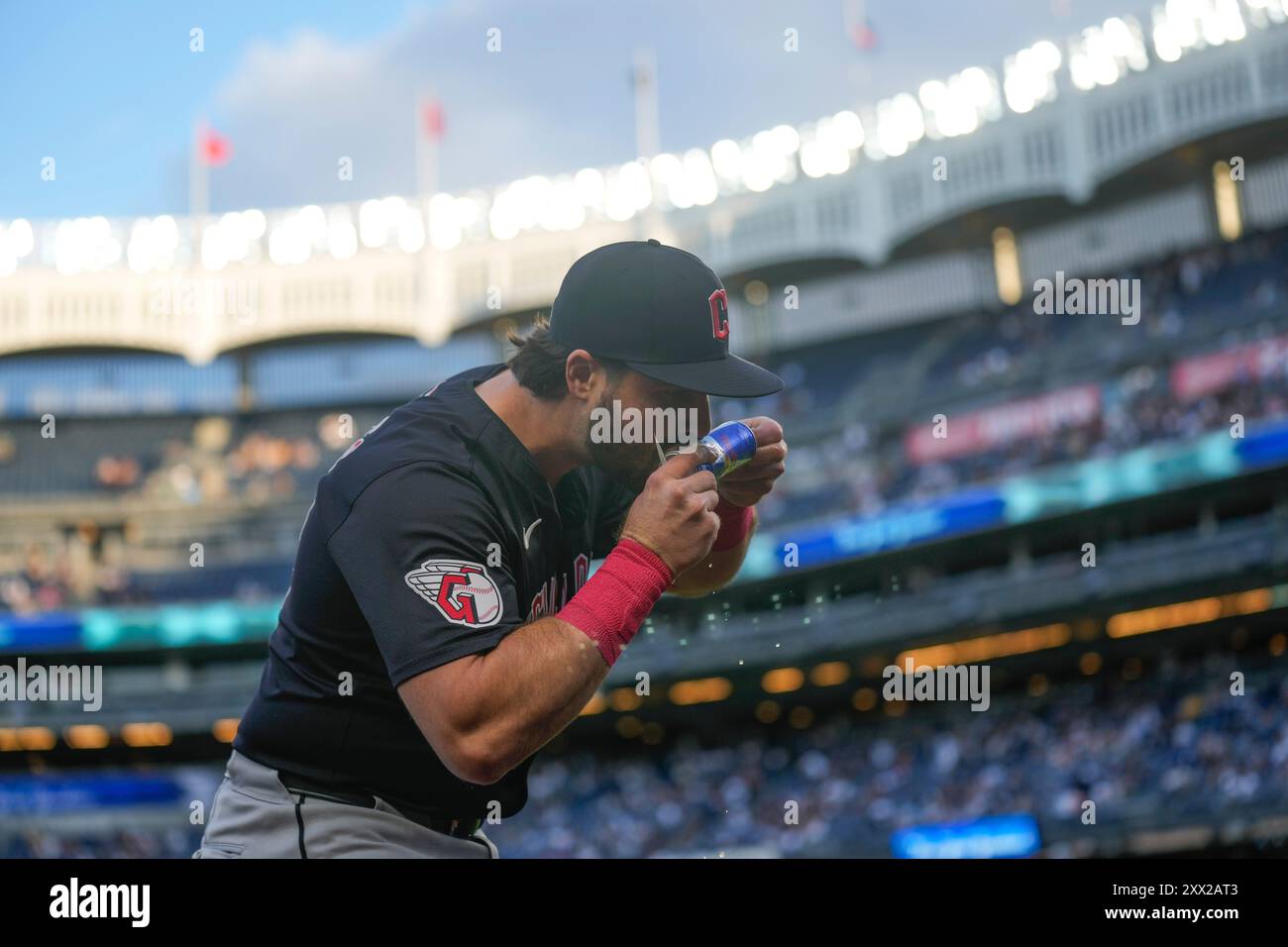Cleveland Guardians' Austin Hedges shotguns an energy drink before the ...