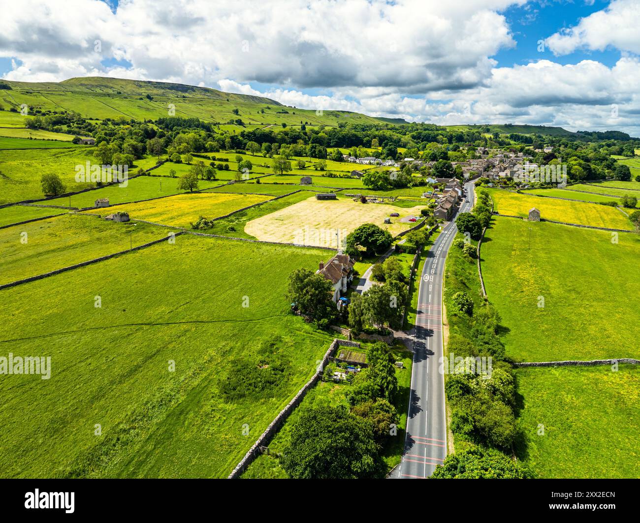 Farms and Fields over Bainbridge Village from a drone, Leyburn, North ...