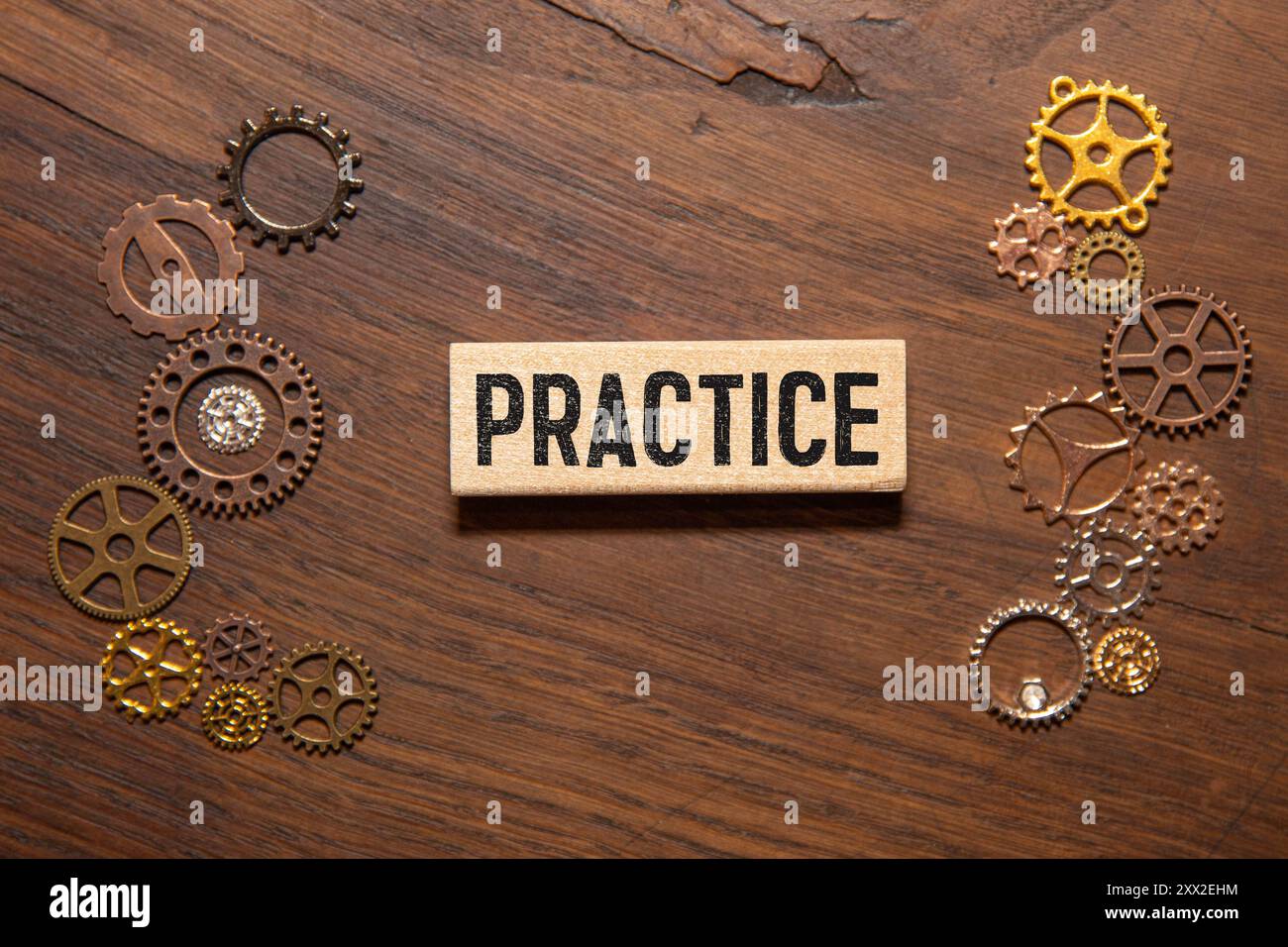 Practice word wooden cubes on pink background Stock Photo - Alamy