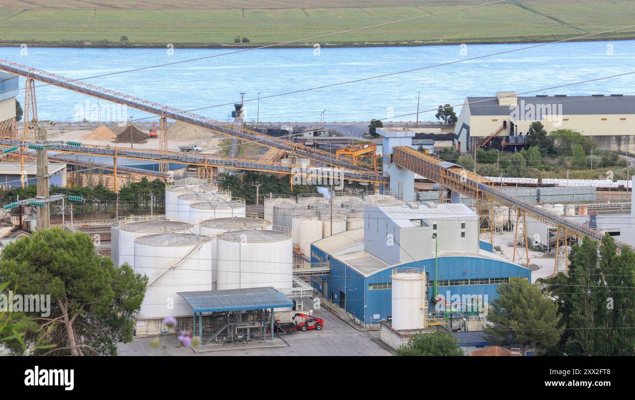 Industrial cement factory manufacturing with storage silos and conveyor ...